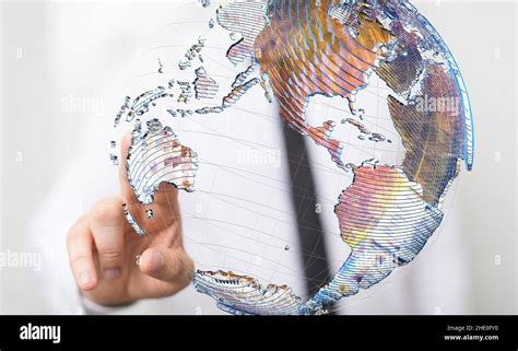 Businessman Tapping On A Floating Render Of A Globe Outline Global