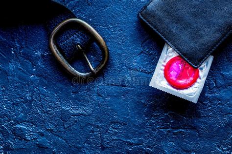 Concept Safe Sex With Condom On Dark Background Top View Stock Image