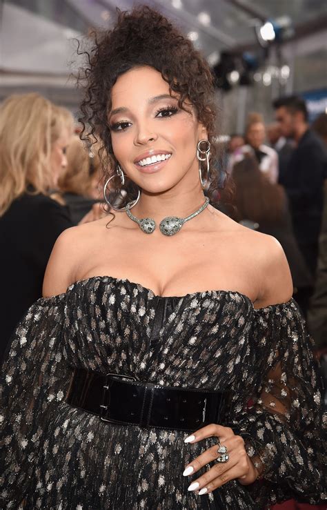 Singer Tinashe Opens Up About Learning To Love Her Curly Hair As Ive
