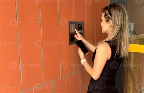 Female Entering Secret Key Code For Getting Access And Passing Building Using Application On