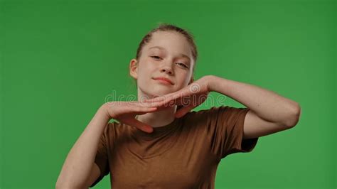 Teenage Girl Posing At Camera Smiling Acting Like Super Model Positive Expression Isolated On