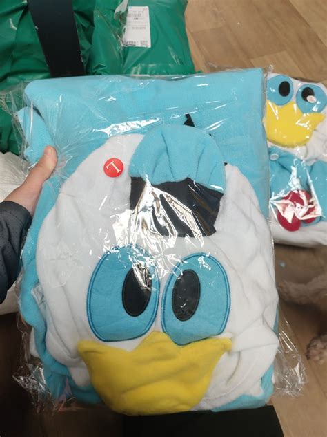 厂家批发摇粒绒唐老鸭卡通连体睡衣秋冬情侣动物高飞家居服表演服 阿里巴巴