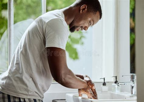 Black Man Washing Hands Or Bathroom Sink Soap In Home Healthcare