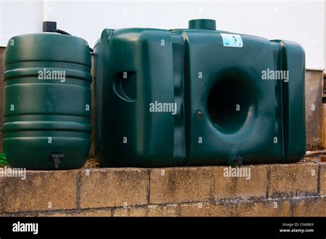 Picture Of Water Butt And Large Water Container Stock Photo Alamy