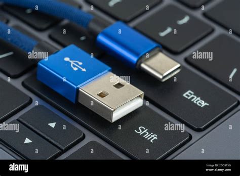 Usb Cable On Buttons Of Laptop Keyboard Stock Photo Alamy