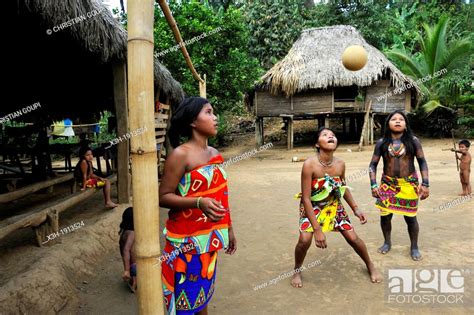 Young Girls Playing Football On A Villages Square Of Embera Native