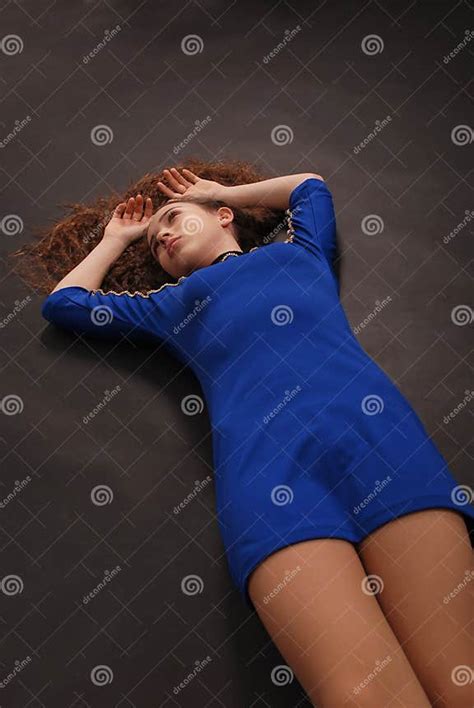 Young Girl With In Blue Dress Lying On The Floor Stock Image Image Of