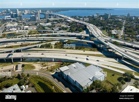 American Freeway Intersection With Fast Driving Cars And Trucks View