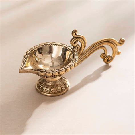 Brass Hand Carved Diya With Handle 10 Inch Darbar Craft