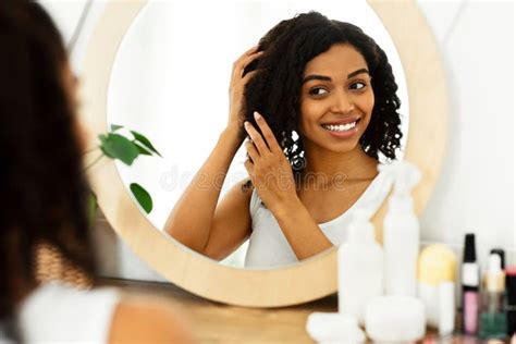 Natural Beauty Happy Black Girl Touching Her Soft Curly Hair Near