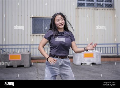 Female Asian Young Artist Dancing K Pop Korean Dance Alone In The City