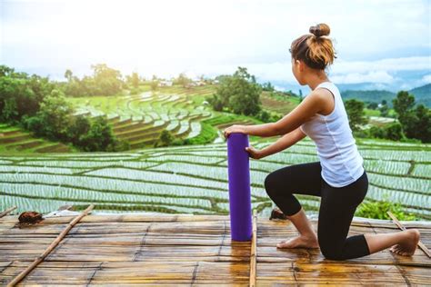 Premium Photo Woman Exercising On Observation Point