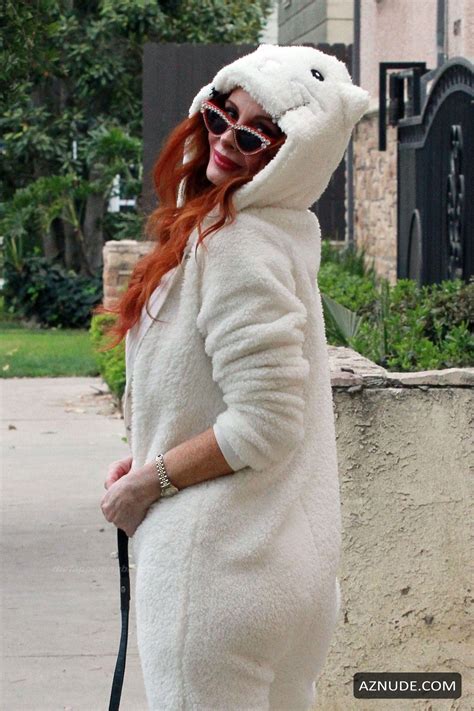 Phoebe Price Wearing A Cat Jumpsuit With Red Lingerie Underneath In
