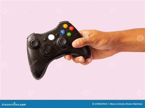 Man Holding A Console Controller Stock Photo Image Of Desk Joystick