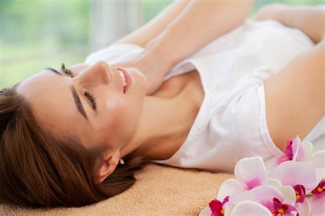 Premium Photo Beautiful Young Woman Enjoying Massage In Spa Salon