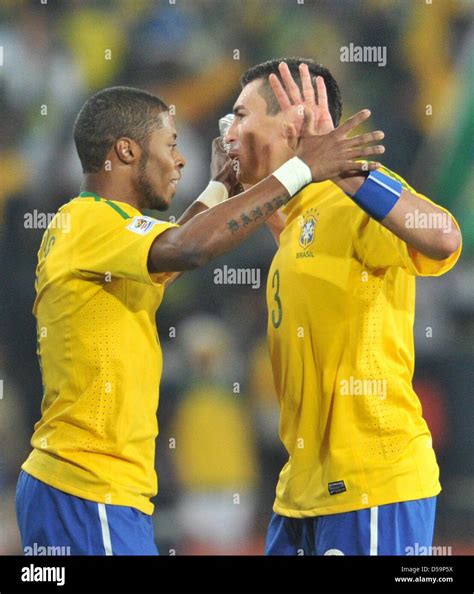 Lucio Of Brazil Celebrates With Michel Bastos L After The Final