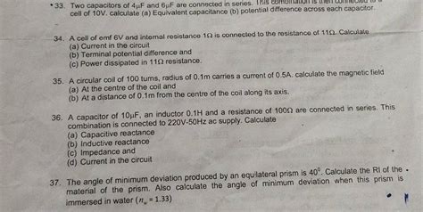 A Circular Coil Of 100 Turns Radius Of 0 1 M Carries A Current Of 0 5 A