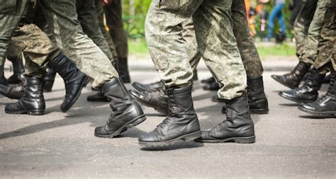 Premium Photo Marching Soldiers In Military Boots