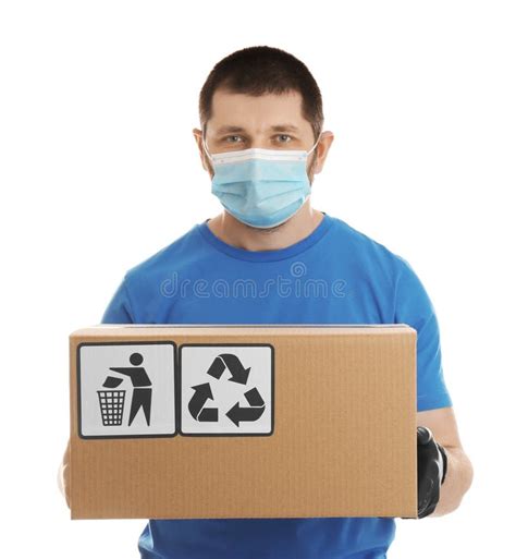 Courier In Mask Holding Cardboard Box With Packaging Symbols On White Background Parcel