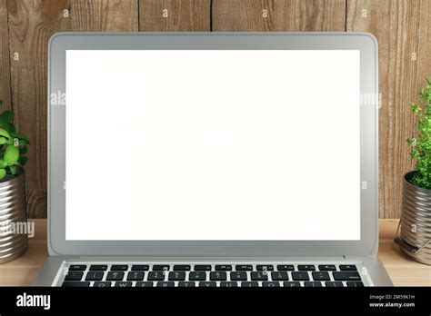 Close Up Laptop Computer On Top Of Office Table Of A Businessman With