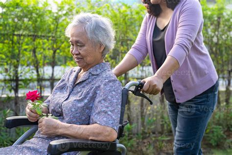 Caregiver Daughter Hug And Help Asian Senior Or Elderly Old Lady Woman