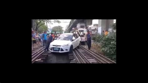Navigation Gone Wrong MMDA Pulls Out Car Stuck Between PNR Tracks YugaAuto Automotive News