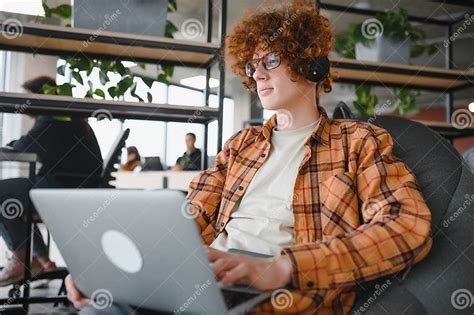 male programmer wear spectacles for eyes protection while working on