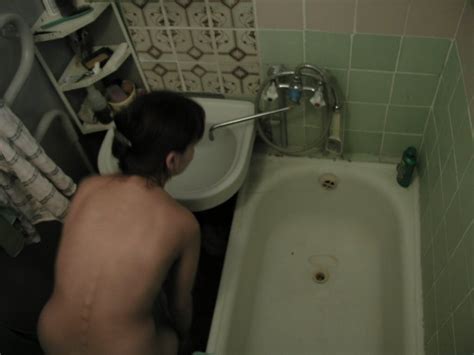 Ceiling Voyeur Hidden Cam Catches Brunette Babe In The Shower Porn