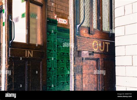 The Wooden Entrance Exit Swing Doors Into The Disused Swimming Pool