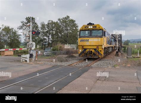 A Rail Freight Diesel 92 Class Locomotive Hauling Coal To The Port At