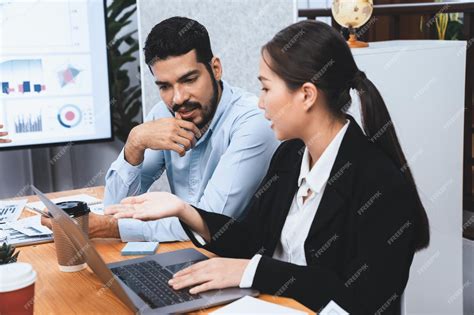 Premium Photo Multiracial Analyst Team Use Bi Dashboard For Data