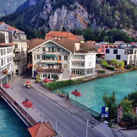 Premium Photo High Angle View Of Road Over Canal Against Houses And