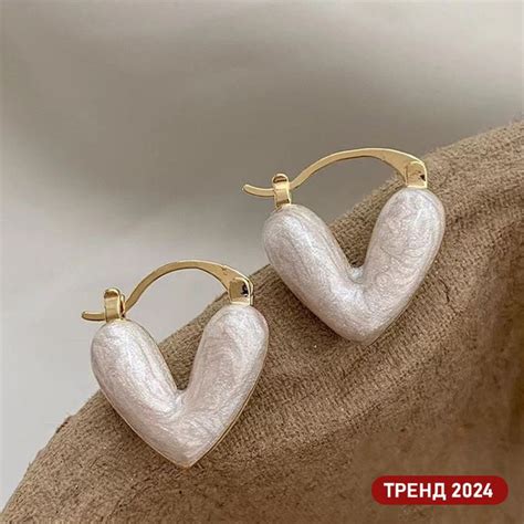 Серьги асимметричные купить на Ozon по низкой цене 1805610233