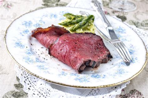 Classic Style Traditional Sunday Roast Beef Steak With Green Asparagus