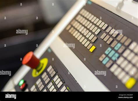 Control Panel Of Cnc Turning Milling Lathe Machine At Factory Plant Red Emergency Switch