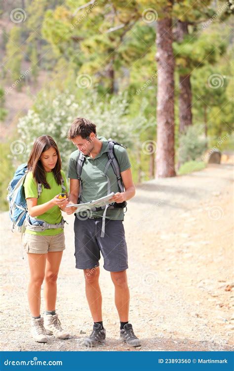 Hikers Hiking Couple Looking At Map Stock Photo Image Of