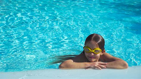 Cute Little Beautiful Girl Swim In Outdoor Swimming Pool 19577102 Stock