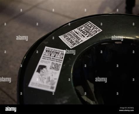 The Anti Mandate Group Placed Stickers On Garbage Cans Light Poles