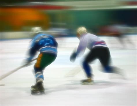 Premium Photo Blurred Motion Of People Ice Skating On Snow