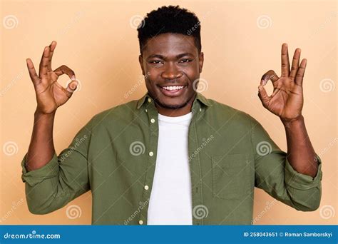 Photo Of Funny Millennial Brunet Guy Show Okey Wear Khaki Shirt