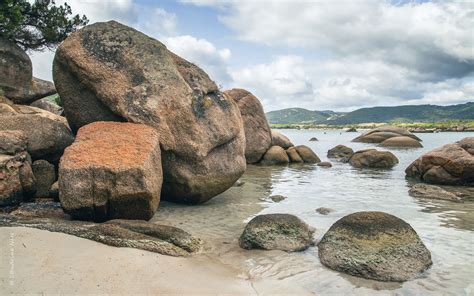 Download Wallpaper 3840x2400 Stones Sea Water Sand Shore 4k Ultra