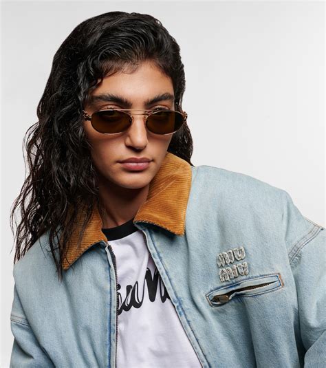 Logo Oval Sunglasses In Green Miu Miu Mytheresa