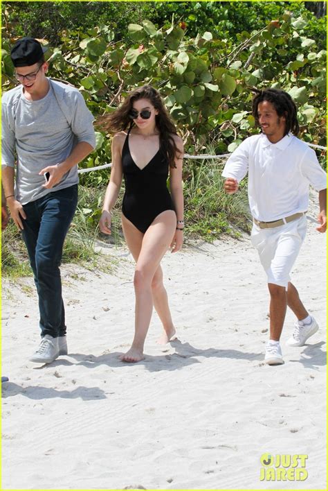 Hailee Steinfeld Wears Plunging One Piece For Miami Beach Day Photo