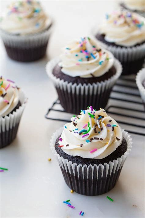 Chocolate Cupcakes With White Frosting And Sprinkles
