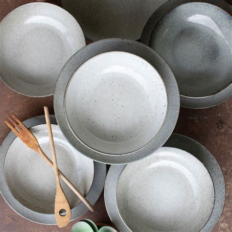 Oatmeal Glazed Ceramic Dinnerware 24 Piece Set Rustic Speckled Plates And Bowls Iron Accents