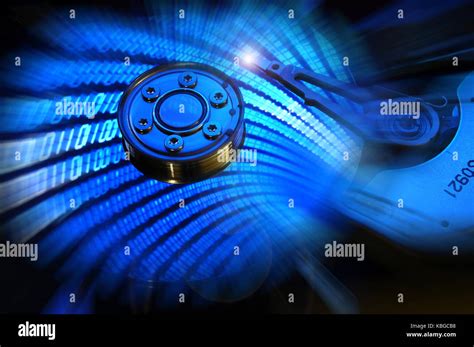 Close Up Of Open Hard Disk With Binary Effects Stock Photo Alamy