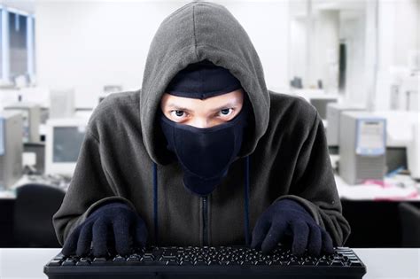 Premium Photo Hacker Stealing Business Information