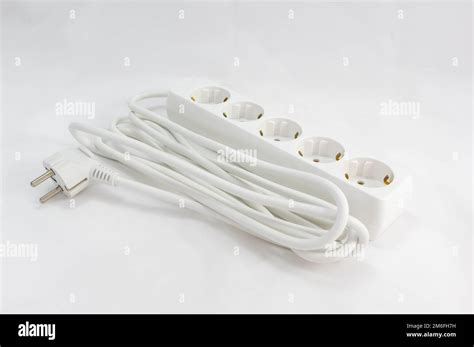 White Extension Cord 5 Sockets On White Background Different Angles