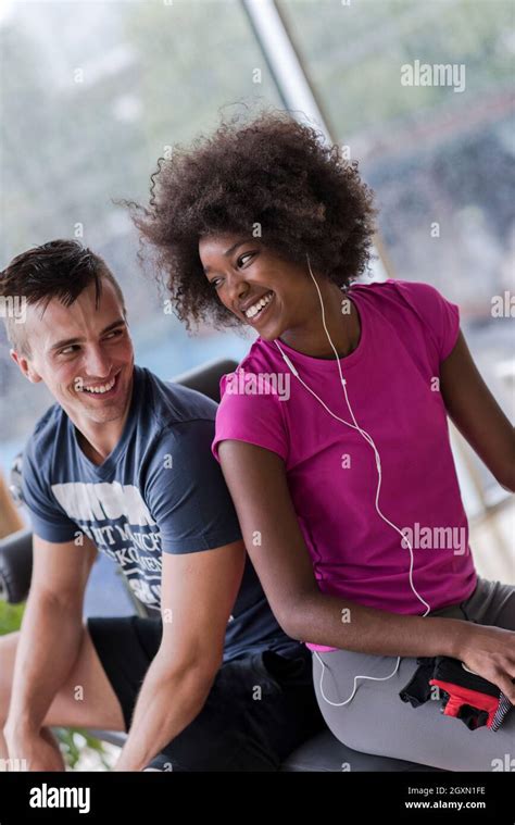 Healthy Couple Have Break At Crossfit Gym African American Woman With