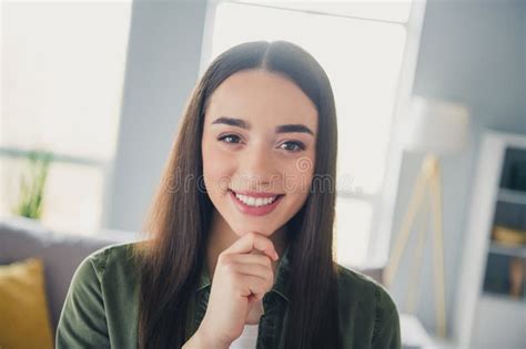 Portrait Of Nice Young Girl Hand Touch Chin Think Wear Green Shirt